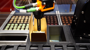 Belgian chocolate shop uses 7th axis robotic arm in production | igus Press