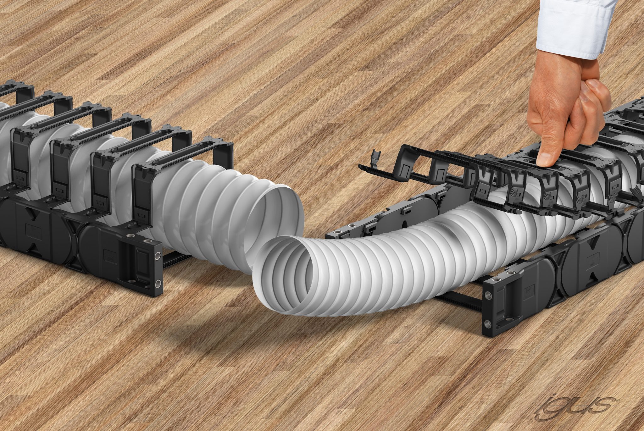 Cable carriers with easy extender crossbars for large hoses | igus®